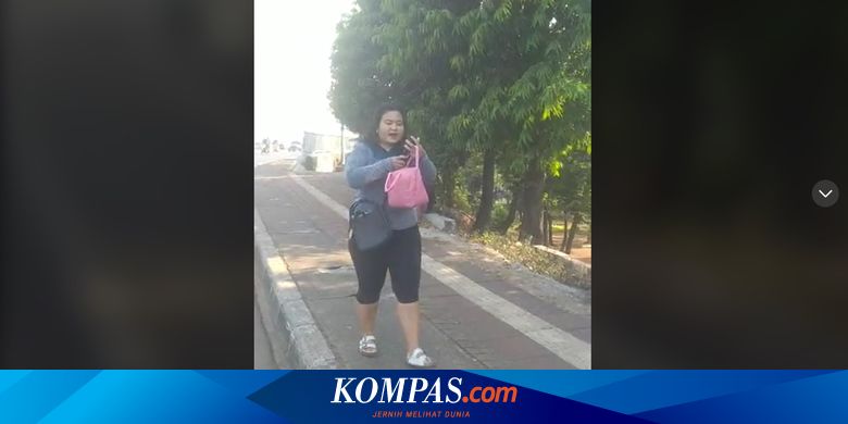 Perempuan Ini Ngotot Tak Mau Pakai Helm karena Rambut Masih Basah